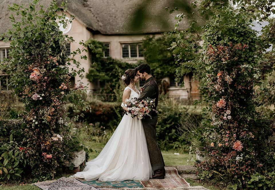 September Wedding with Floral Bridesmaid Dresses & Autumnal Flowers
