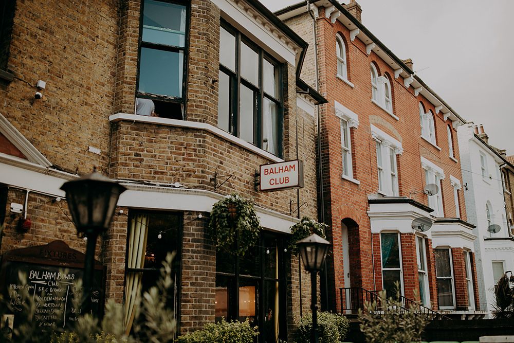 Balham Bowls Club Wedding with DIY Doughnut Wall and Retro Games